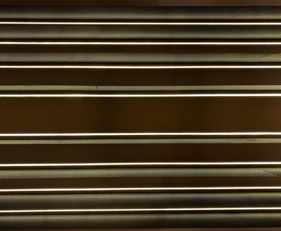 Elevating Elegance with a Tiered Wire Mesh Ceiling Feature Banker Wire