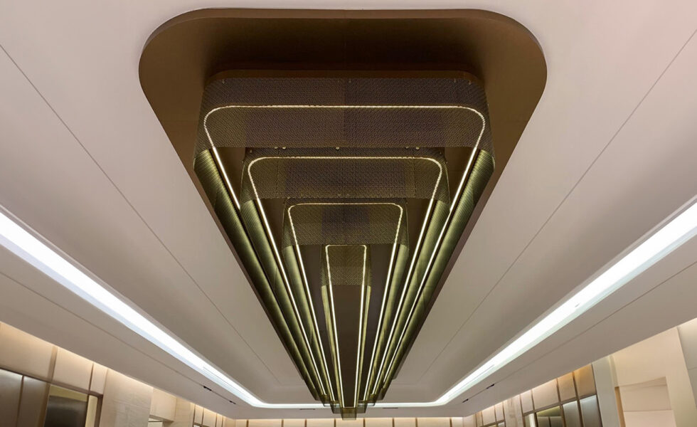 Elevating Elegance with a Tiered Wire Mesh Ceiling Feature Banker Wire